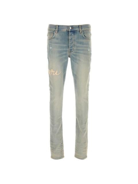 AMIRI Script Logo skinny jeans | REVERSIBLE
