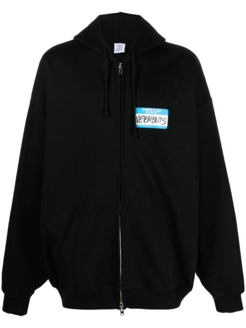 VETEMENTS Name-tag print zip-up hoodie | REVERSIBLE