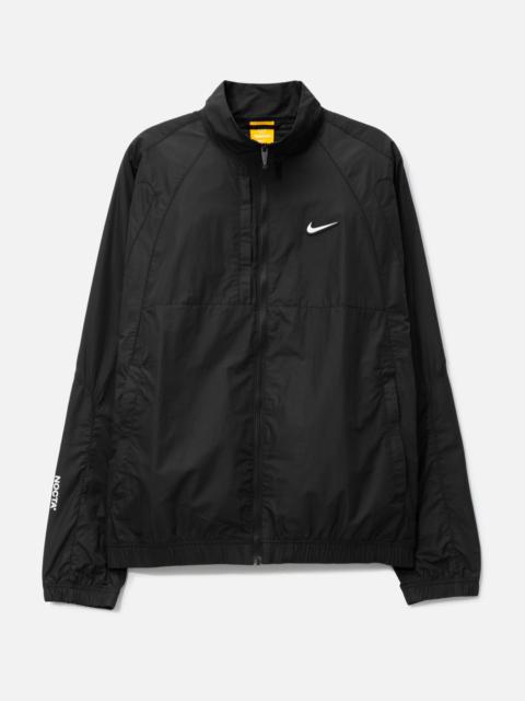 Nike NOCTA NORTHSTAR NYLON TRACK JACKET | REVERSIBLE