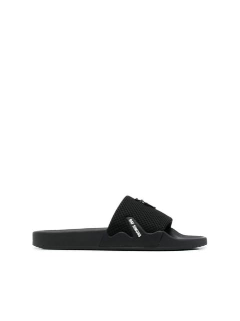 Raf Simons Astra logo slides | REVERSIBLE