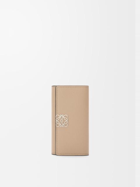 Loewe Anagram key case in pebble grained calfskin | REVERSIBLE