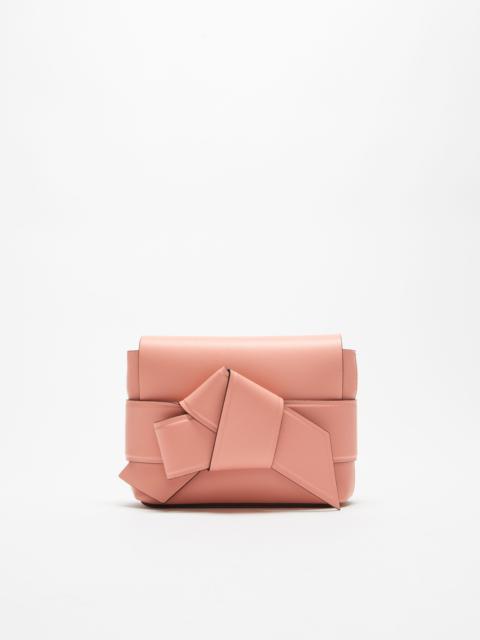 Acne Studios Musubi mini crossbody bag - Salmon pink | REVERSIBLE