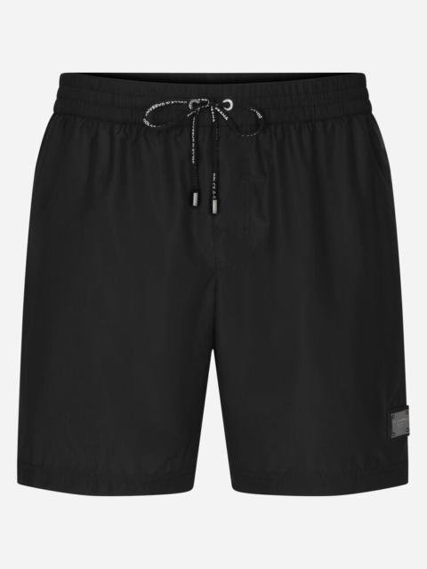 Dolce & Gabbana Mid-length swim trunks with branded plate | REVERSIBLE
