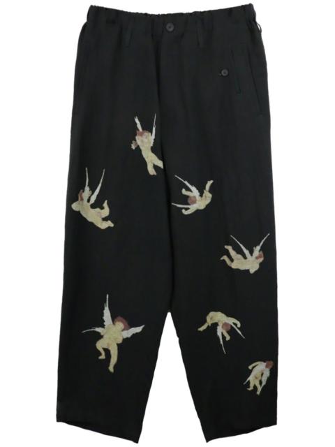 Yohji Yamamoto angel-print trousers | REVERSIBLE