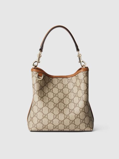 GUCCI GG Emblem mini bucket bag | REVERSIBLE