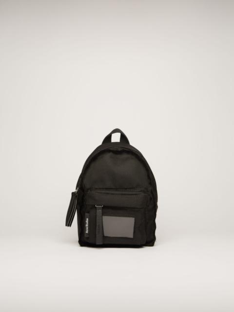 Acne Studios Mini backpack black | REVERSIBLE