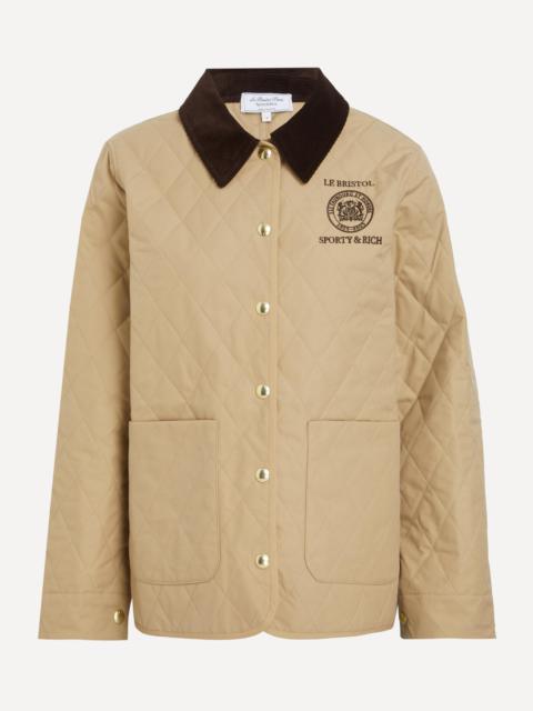 Sporty & Rich Crest Seal 100th Quilted Jacket | REVERSIBLE